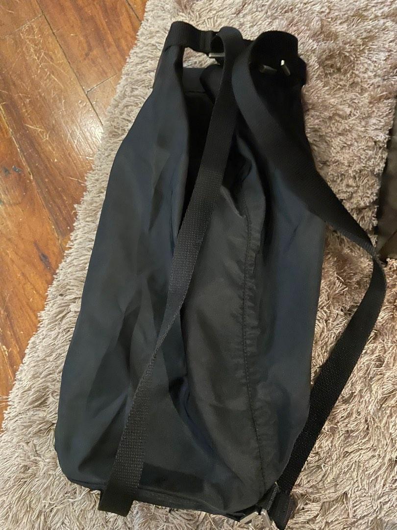 Prada bucket style backpack, Luxury, Bags & Wallets on Carousell