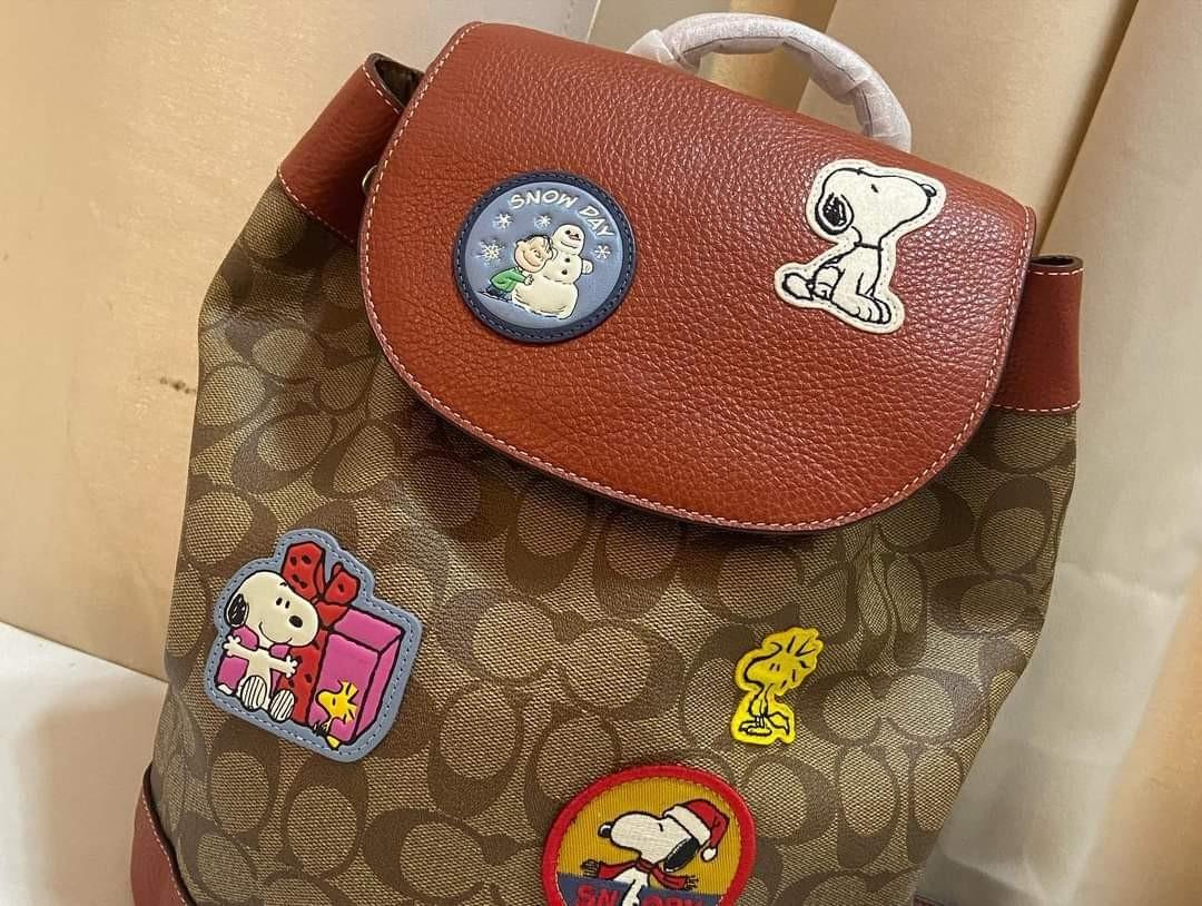 Coach X Peanuts Dempsey Drawstring Backpack In Signature Canvas With ...