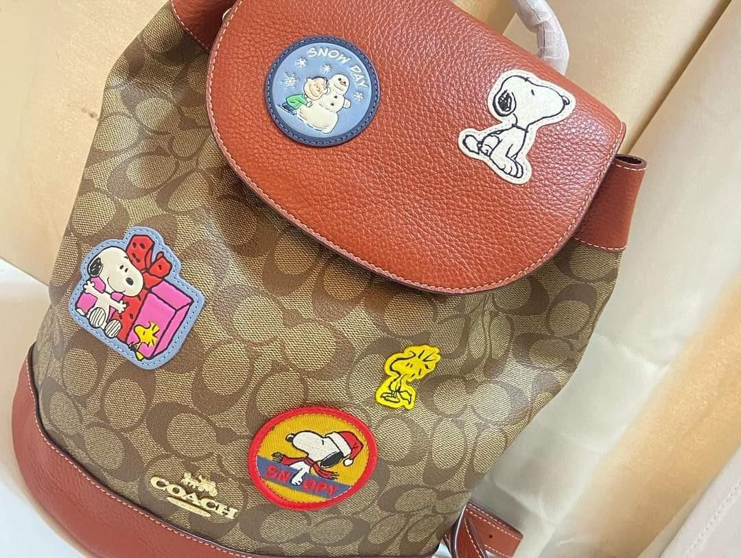 Coach X Peanuts Dempsey Drawstring Backpack In Signature Canvas With ...