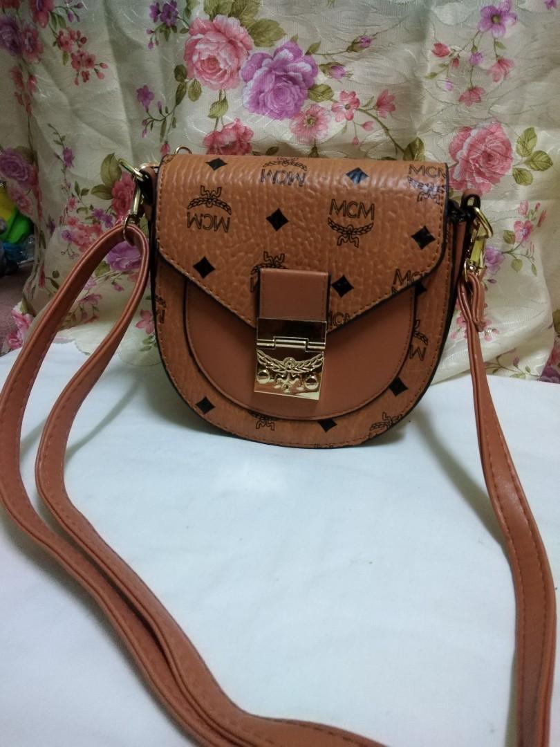 MCM sling cross - body bag, Women's Fashion, Bags & Wallets, Cross-body Bags on Carousell
