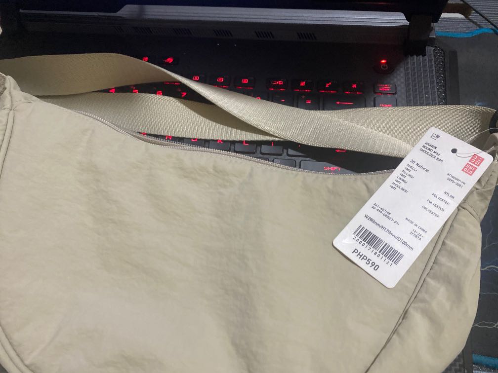 Uniqlo Beige Dumpling Bag, Women's Fashion, Bags & Wallets, Shoulder ...