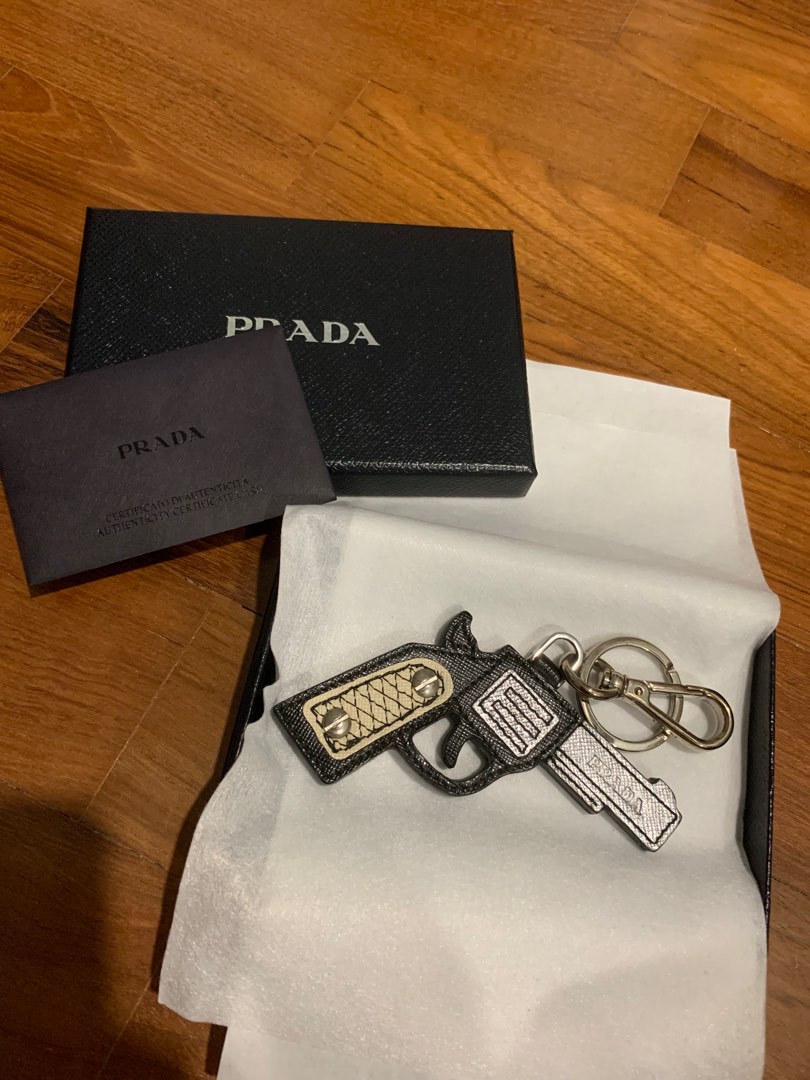 Prada Gun Keychain, Luxury, Accessories on Carousell