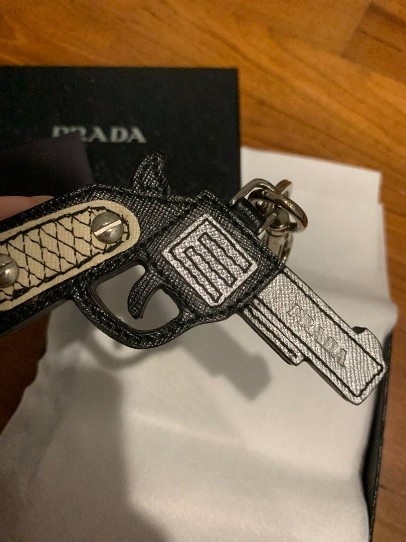 Prada Gun Keychain, Luxury, Accessories on Carousell