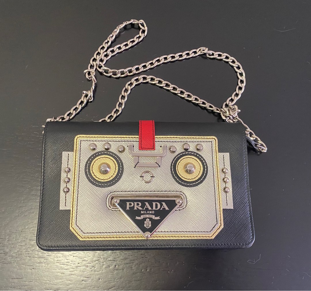 Prada robot wallet on chain, Luxury, Bags & Wallets on Carousell