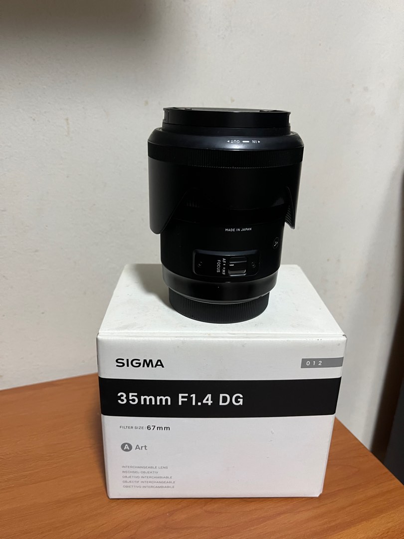 Sigma 35mm f1.4 EF mount lens (with freebies), Photography, Lens & Kits on Carousell