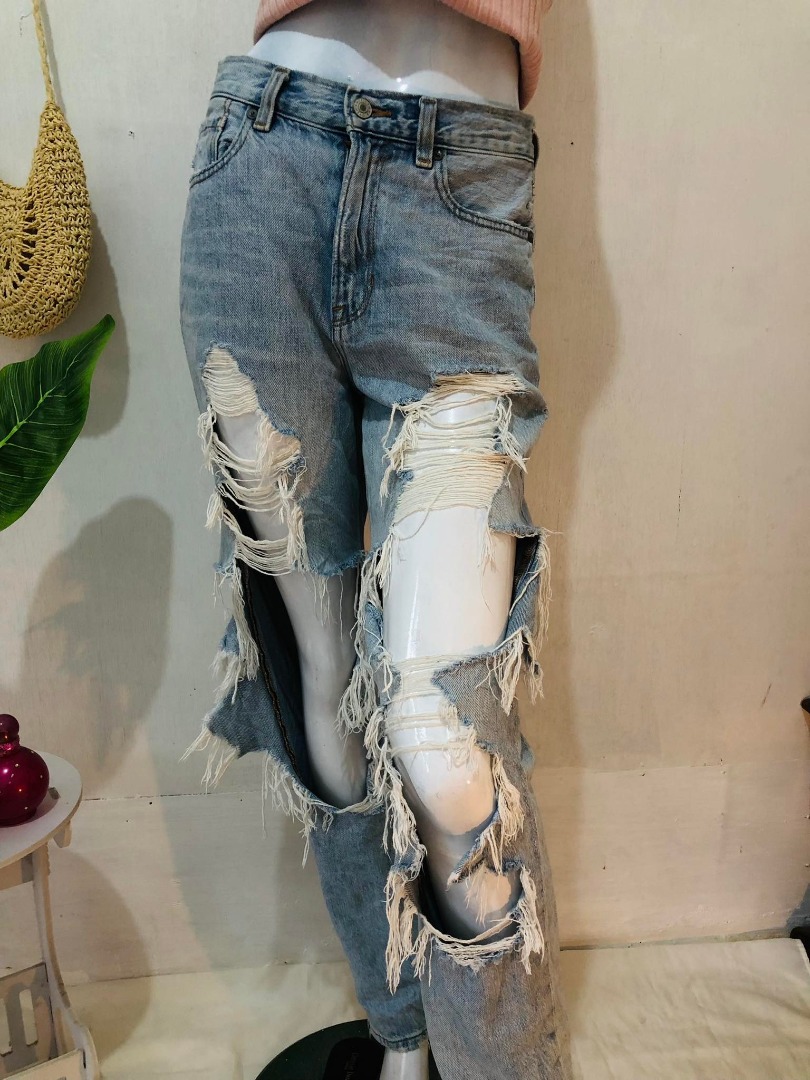 Tattered Denim Jeans, Women's Fashion, Bottoms, Jeans on Carousell