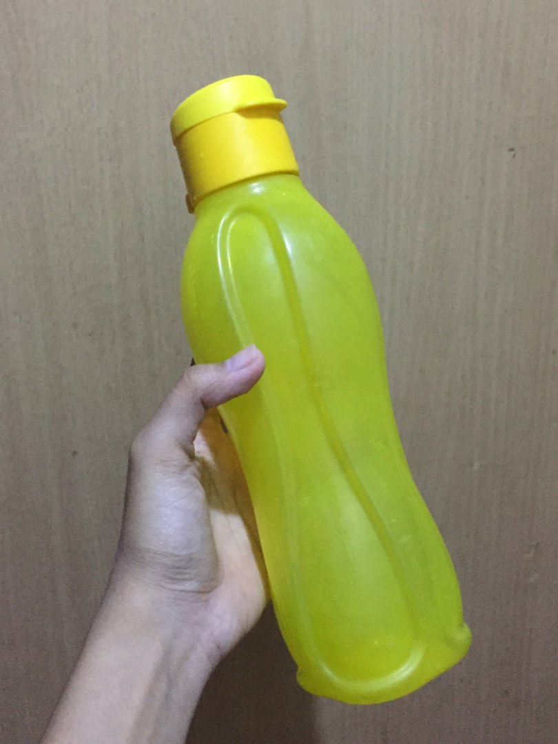 ORIGINAL yellow tupperware water bottle # slim handy aesthetic ...