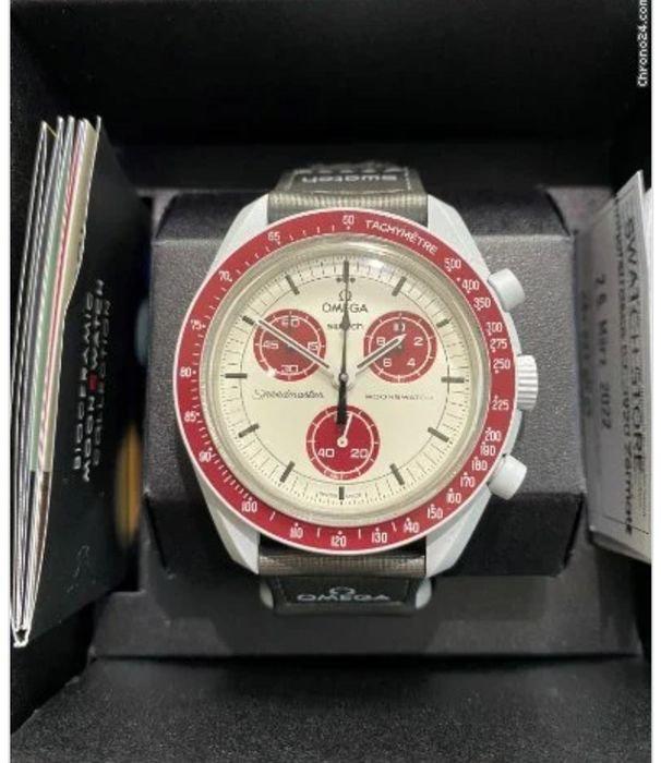 Swatch Omega Pluto, Luxury, Watches on Carousell