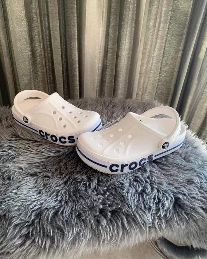 Crocs White Hole, Men's Fashion, Footwear, Slippers & Slides on Carousell