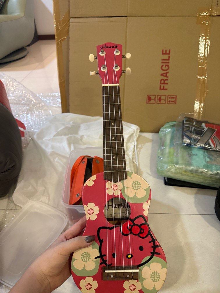 cute hello kitty ukulele, Hobbies & Toys, Music & Media, Musical Instruments on Carousell