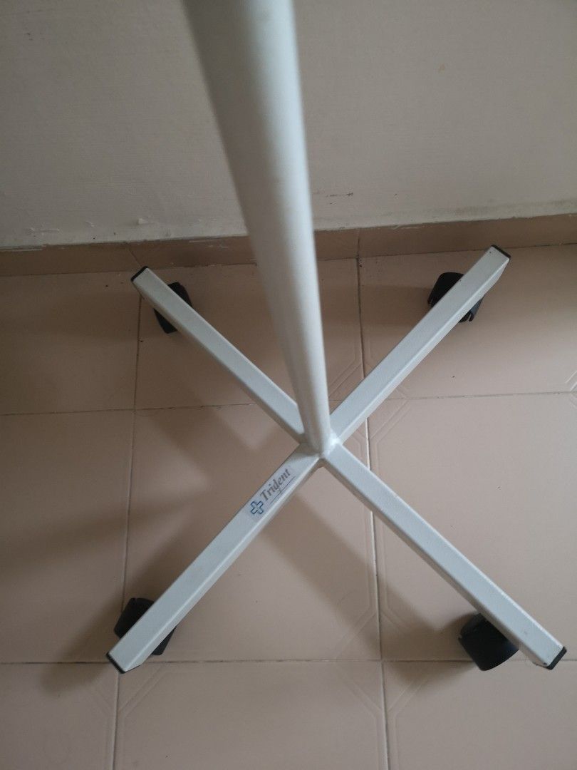 Portable IV drip stand. Sturdy 4 wheel base and height adjustable ...
