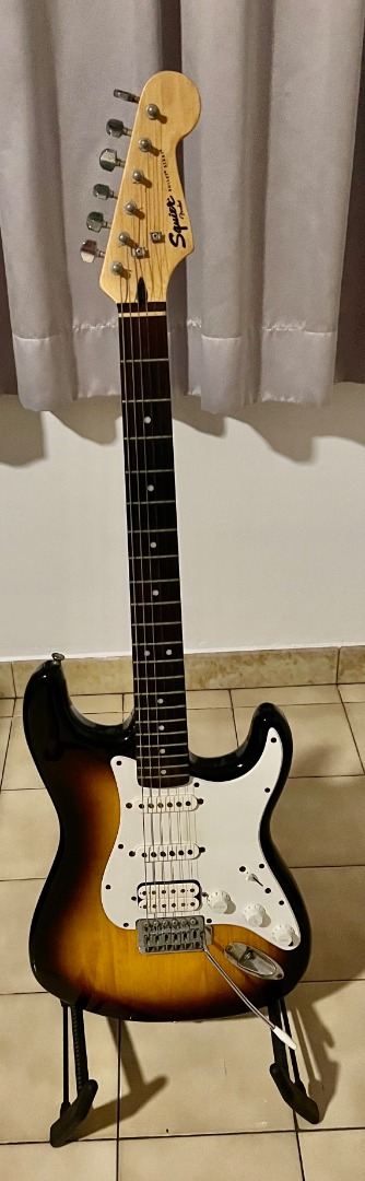 Fender Squier 3 / 4 Electric Guitar with stand, case and extra strings ...