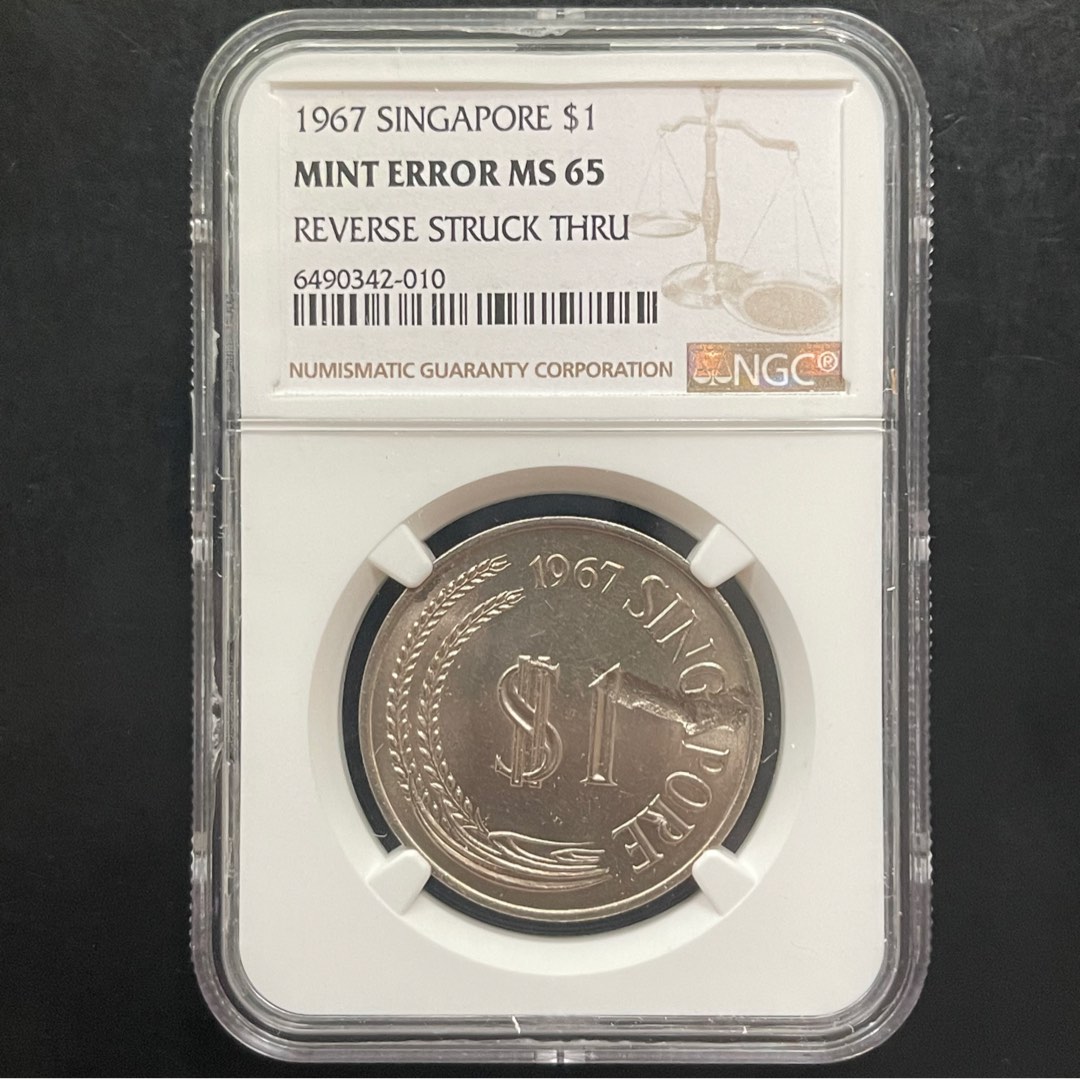 Mint Error $1 MS65, 1967 Singapore Lion $1 , Reverse Struck Through Mint Error, NGC MS65 ...