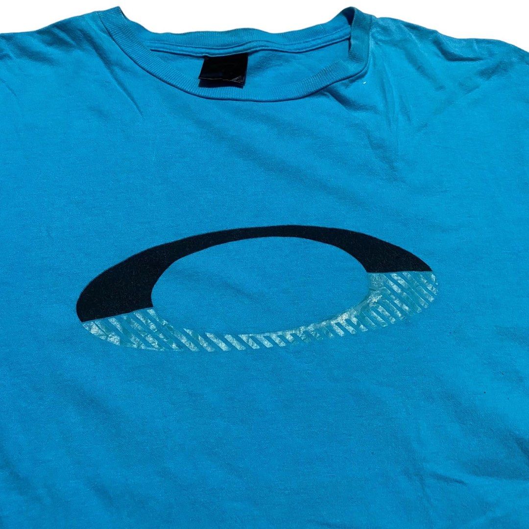 Oakley big O tee, Fesyen Pria, Pakaian , Atasan di Carousell
