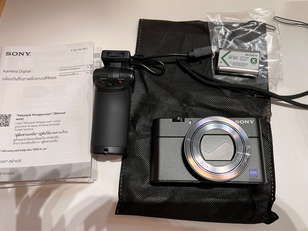 Sony RX100 M5 Mark V + Sony tripod, Photography, Cameras on Carousell