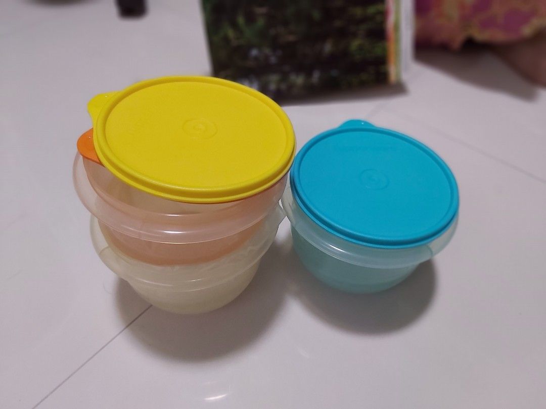 Tupperware round containers with patterns at the side., Furniture ...