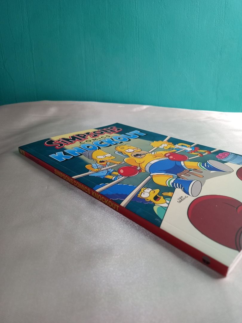 SIMPSONS COMICS "KNOCK OUT", Hobbies & Toys, Books & Magazines, Comics & Manga on Carousell