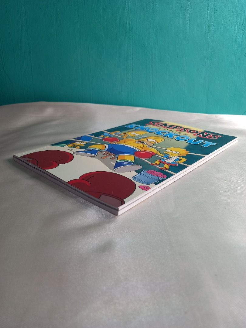 SIMPSONS COMICS "KNOCK OUT", Hobbies & Toys, Books & Magazines, Comics & Manga on Carousell