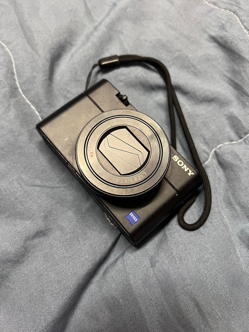 Sony RX100 V + batteries, Photography, Cameras on Carousell