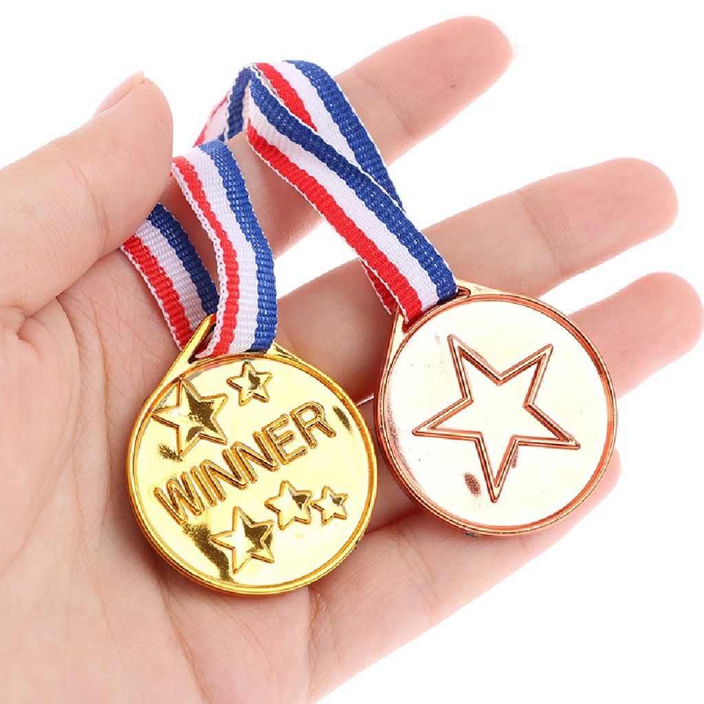 Toy medals competition medal gold silver bronze winners game sports day ...