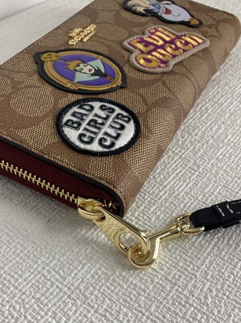 Coach x Disney Ursula Long wallet, Women's Fashion, Bags & Wallets ...