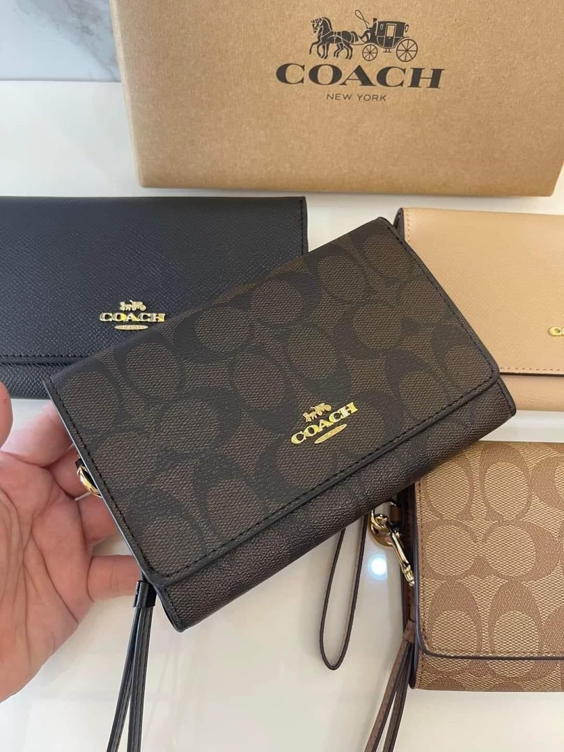 coach wrislet wallet, Luxury, Bags & Wallets on Carousell