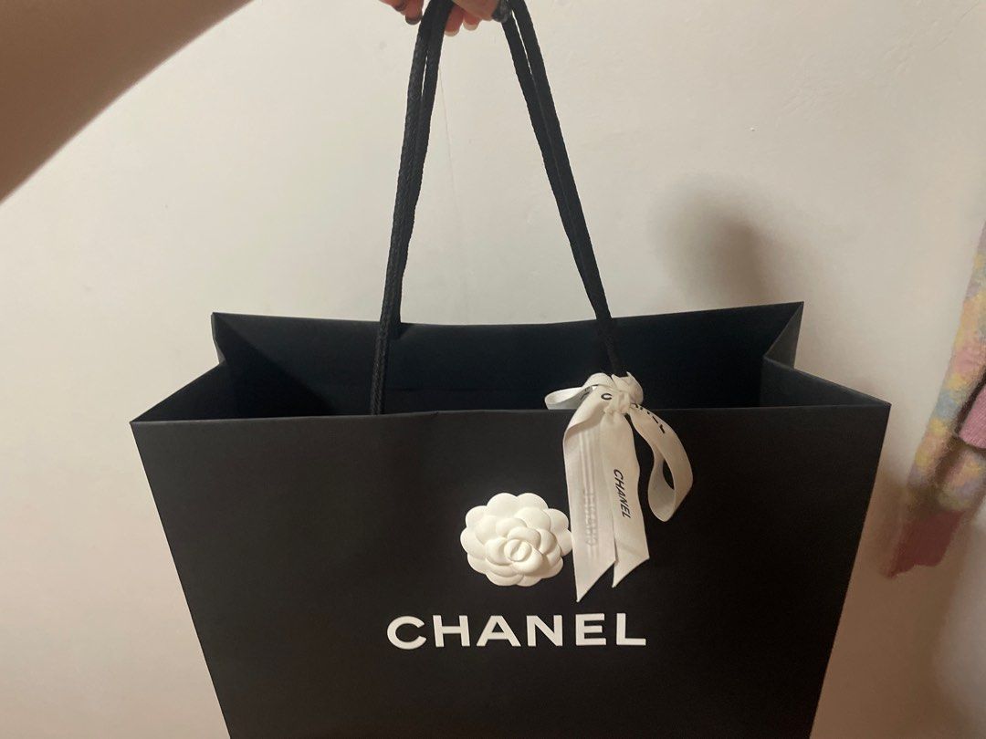 Chanel paper bag, Luxury, Bags & Wallets on Carousell