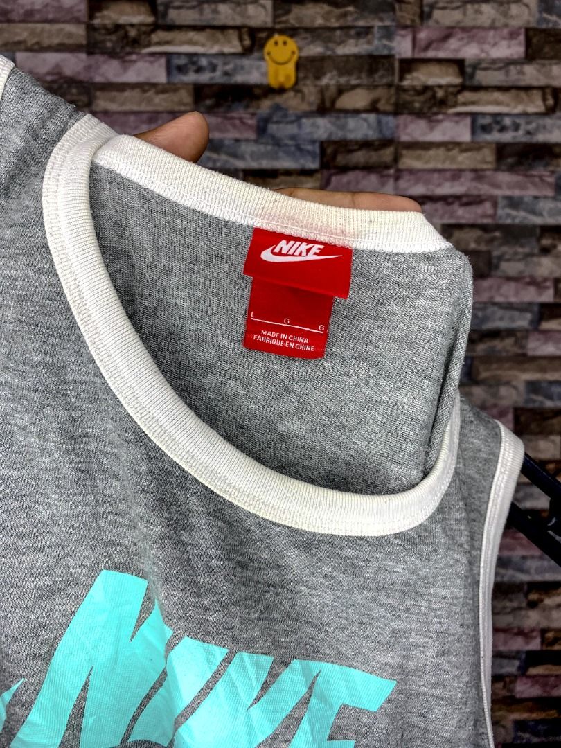 NIKE RED TAG, Men's Fashion, Activewear on Carousell