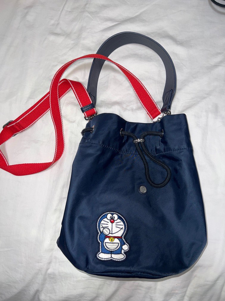 Kipling Doraemon bucket bag, Women's Fashion, Bags & Wallets, Tote Bags ...