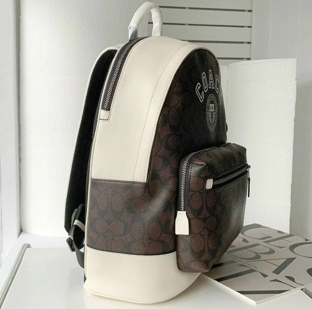 CB909 Coach West Backpack In Signature Canvas With Varsity Motif ...