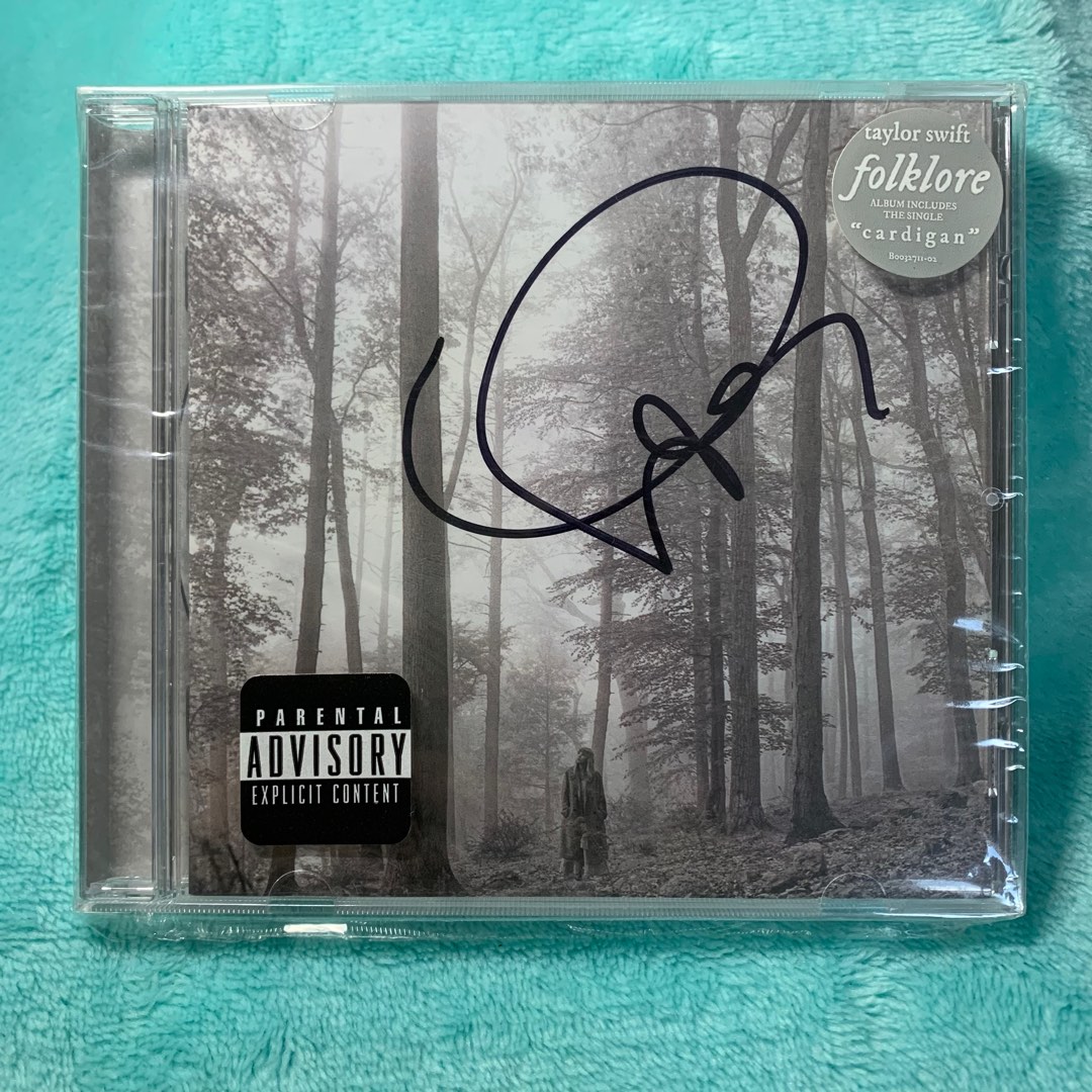 Taylor Swift folklore signed, Hobbies & Toys, Music & Media, CDs & DVDs on Carousell