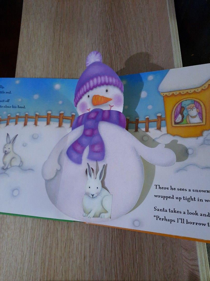 Santa's New Suit (A pop-up story), 興趣及遊戲, 書本 & 文具, 小朋友書 - Carousell