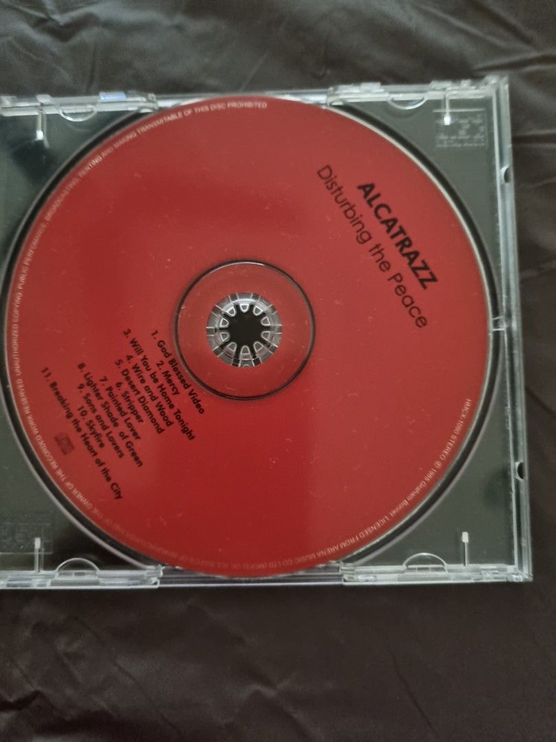 CD Alcatrazz Disturbing The Peace, Hobbies & Toys, Music & Media, CDs ...