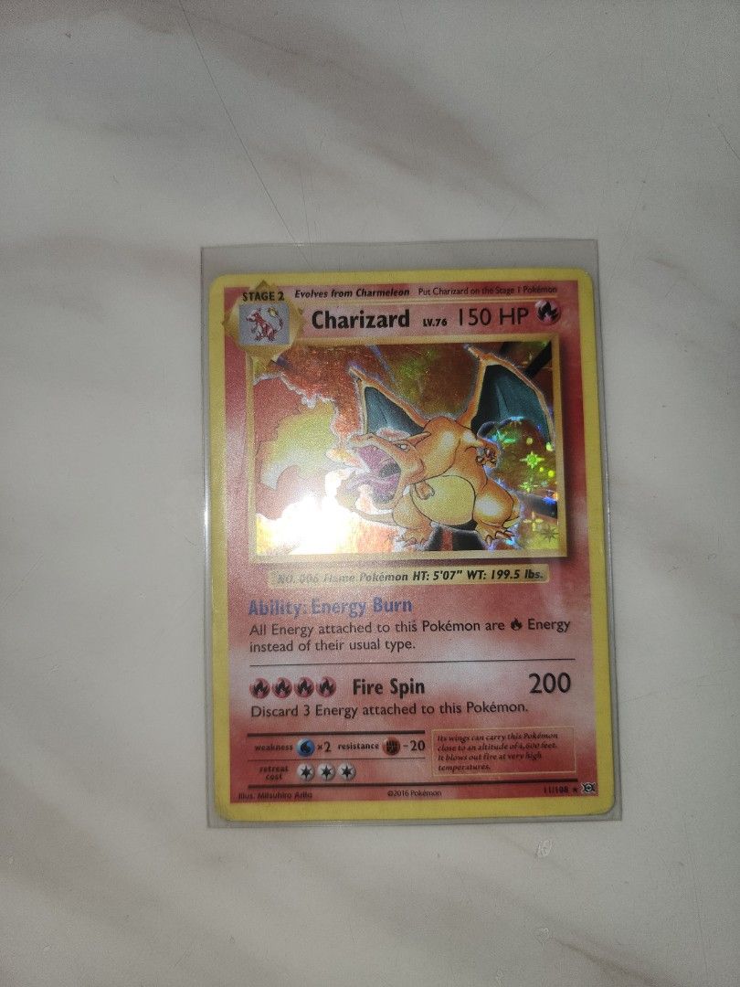Holographic charizard 11/108, Hobbies & Toys, Toys & Games on Carousell