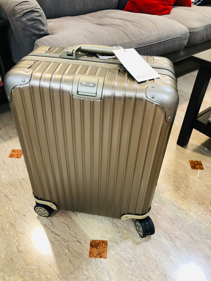Brand new Rimowa gold titanium cabin plus, Hobbies & Toys, Travel ...