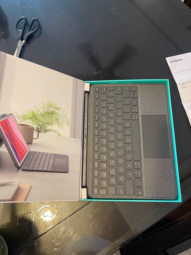 Detachable keyboard with track pad and smart connector technology ...