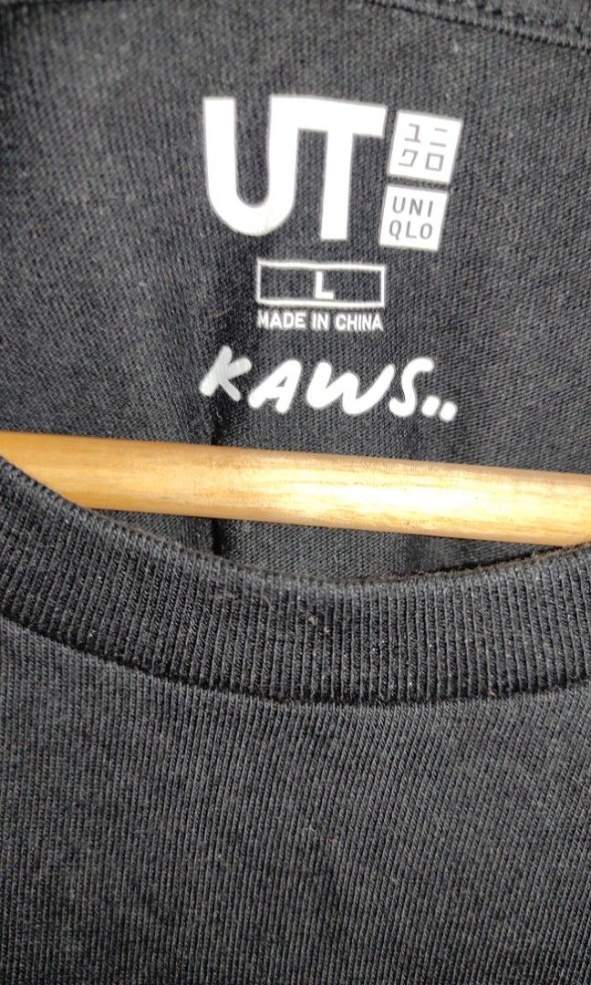 Uniqlo kawx, Men's Fashion, Tops & Sets, Tshirts & Polo Shirts on Carousell