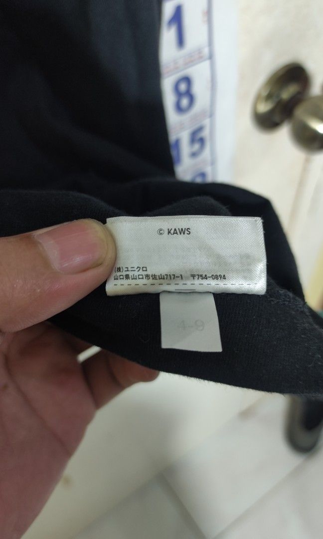 Uniqlo kawx, Men's Fashion, Tops & Sets, Tshirts & Polo Shirts on Carousell