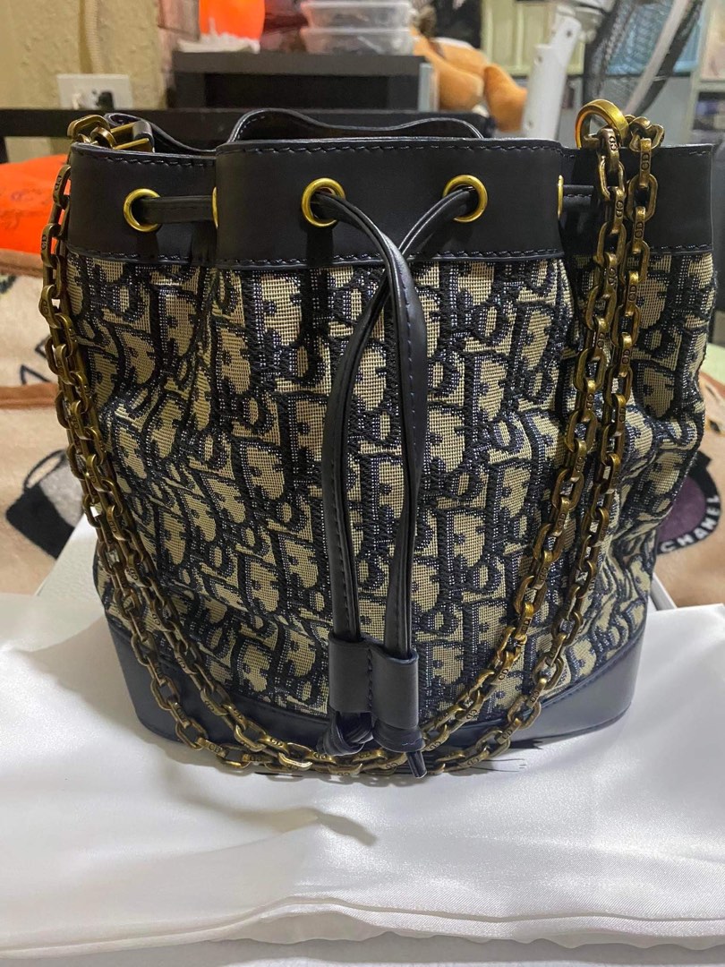 dior bucket bag, Luxury, Bags & Wallets on Carousell