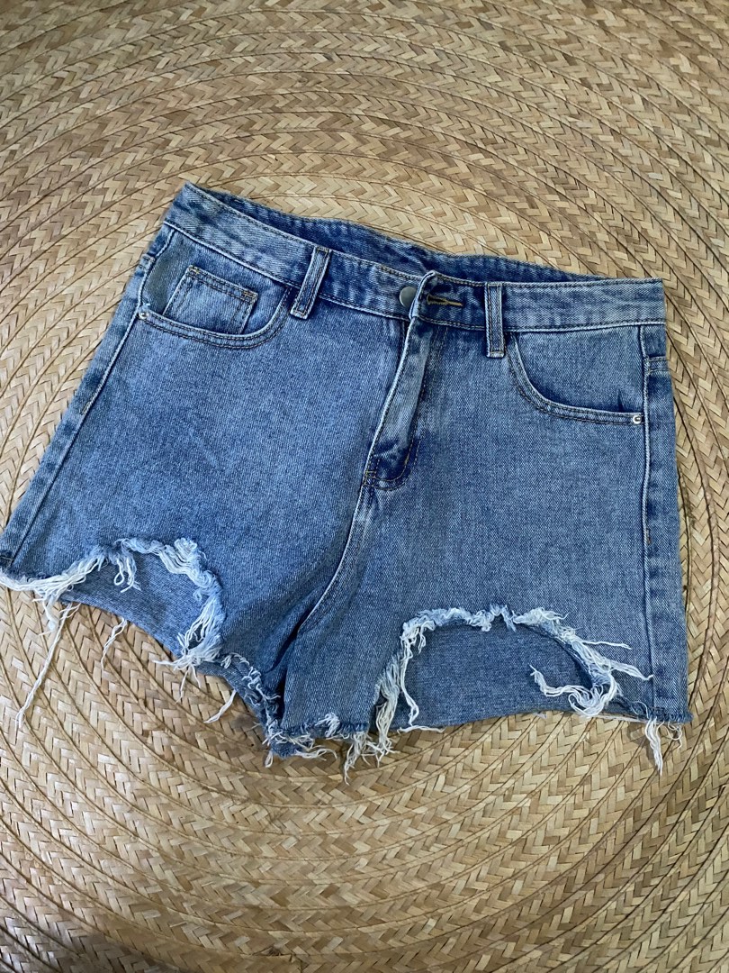 Tattered denim short, Women's Fashion, Bottoms, Shorts on Carousell