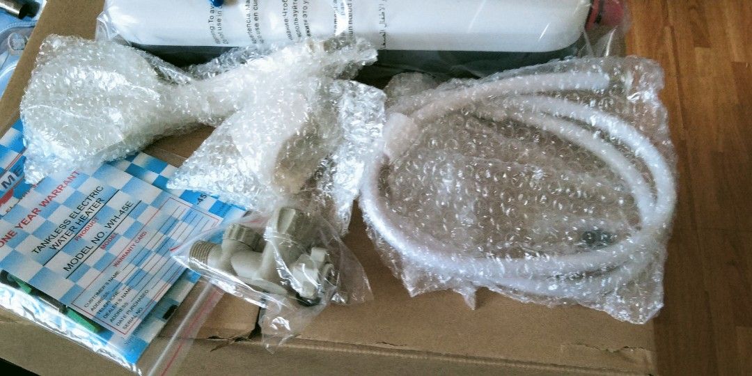 Meco tankless Shower heater, Furniture & Home Living, Bathroom ...