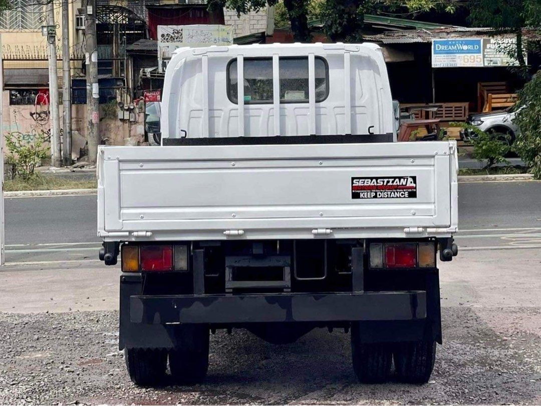 2022 Isuzu Elf Dropside 10.6ft. Camel Chassis Molye 4HF1 Inline ...