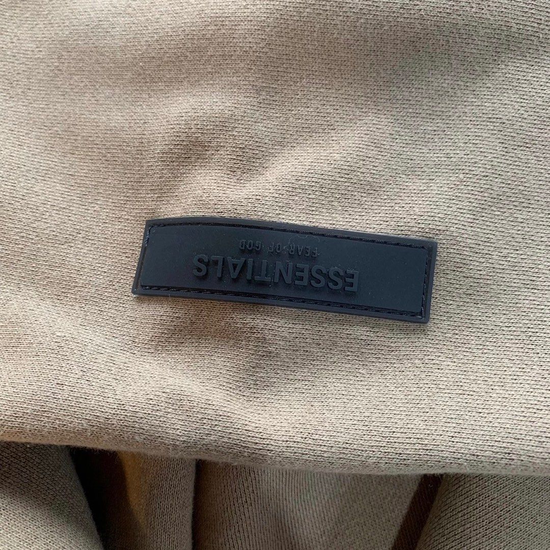 Fear Of God Essentials Center Text Logo Hoodie, Men's Fashion, Tops ...