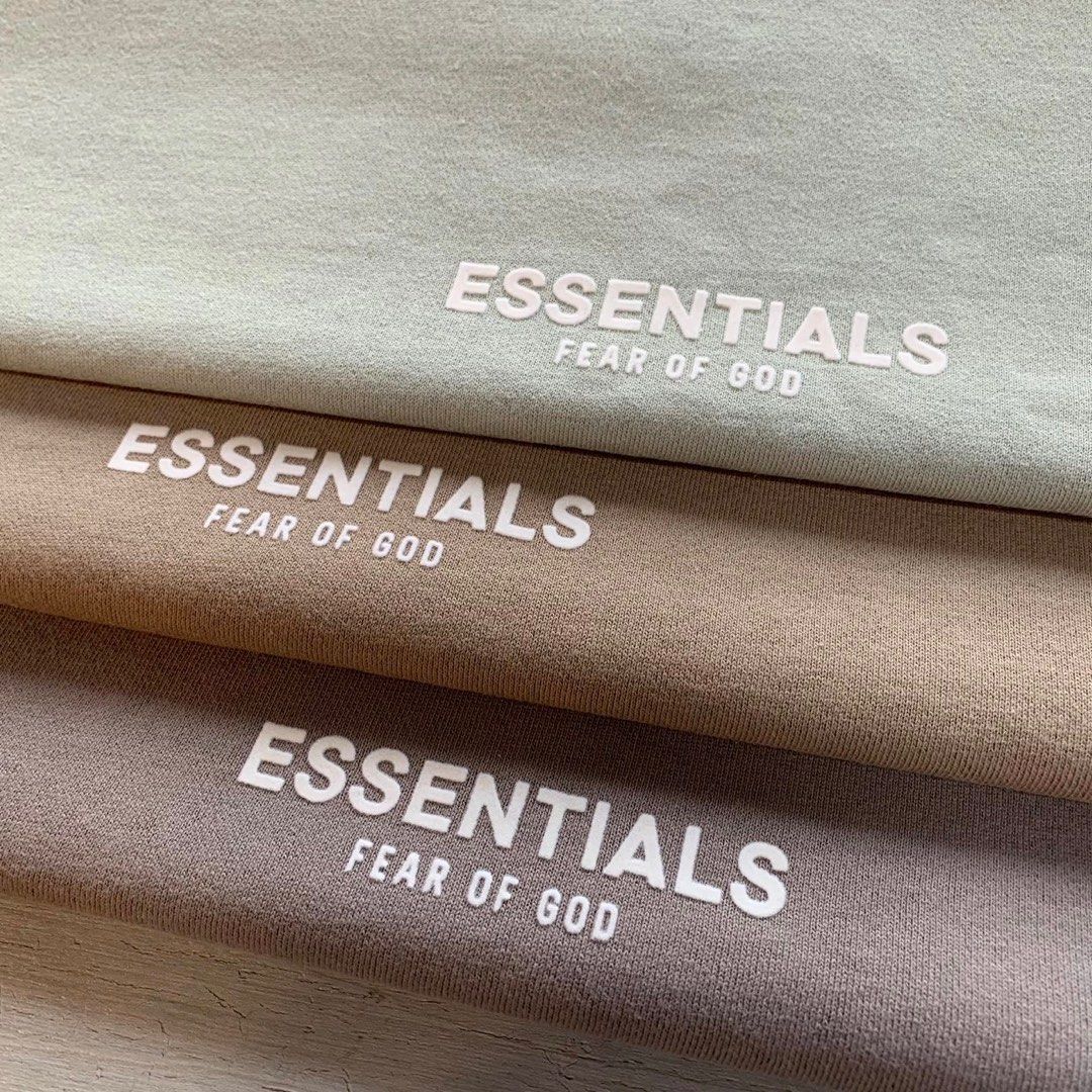 Fear Of God Essentials Center Text Logo Hoodie, Men's Fashion, Tops ...