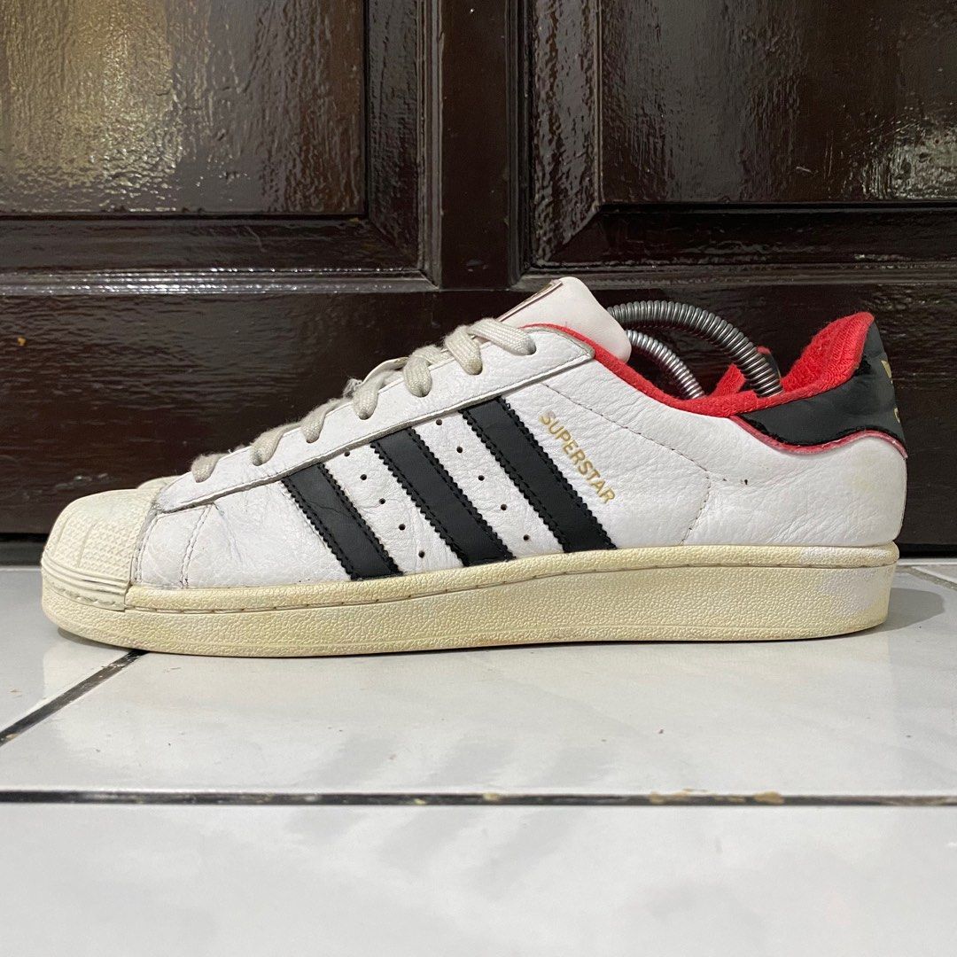 Pair Of White And Black Superstar 80s Sneakers Made By, 53% OFF