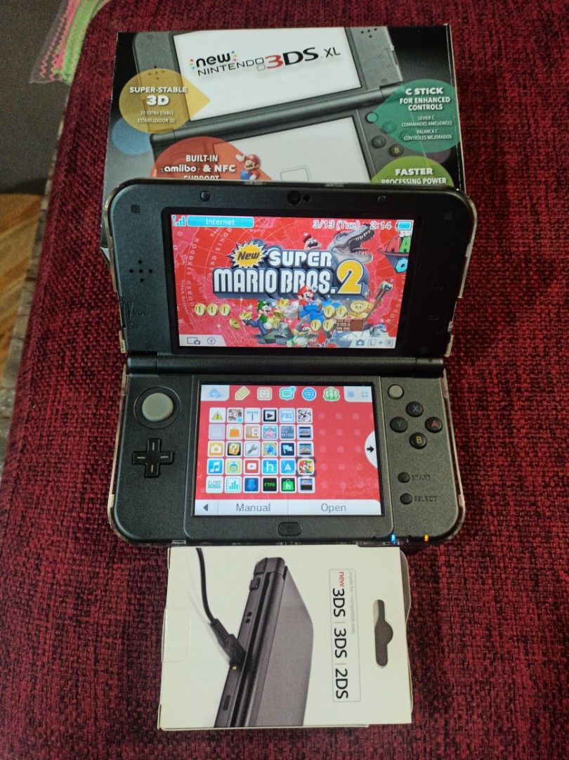 New Nintendo 3DS XL with 128 GB storage. Grey color with box and charger and manual. Full set ...