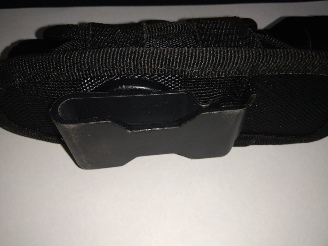 Torch light holder with swivel belt clip, Sports Equipment, Hiking ...