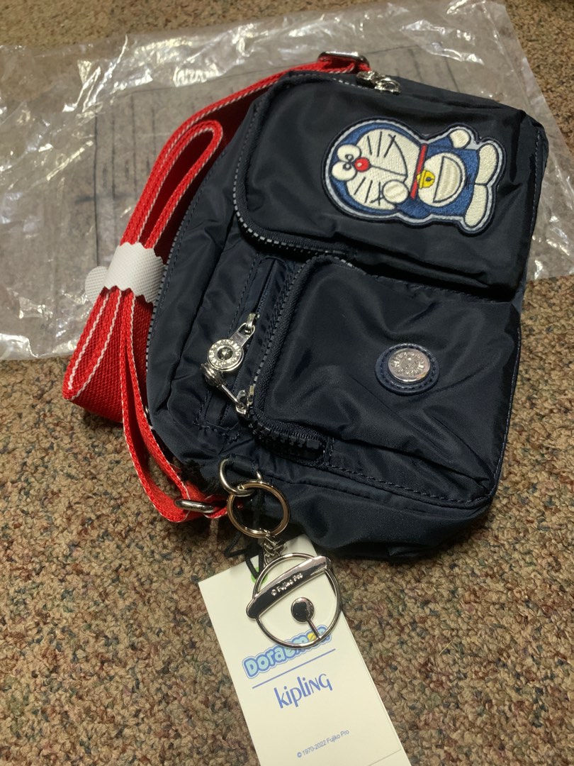 KIPLING ALBENA DORAEMON, Women's Fashion, Bags & Wallets, Cross-body ...