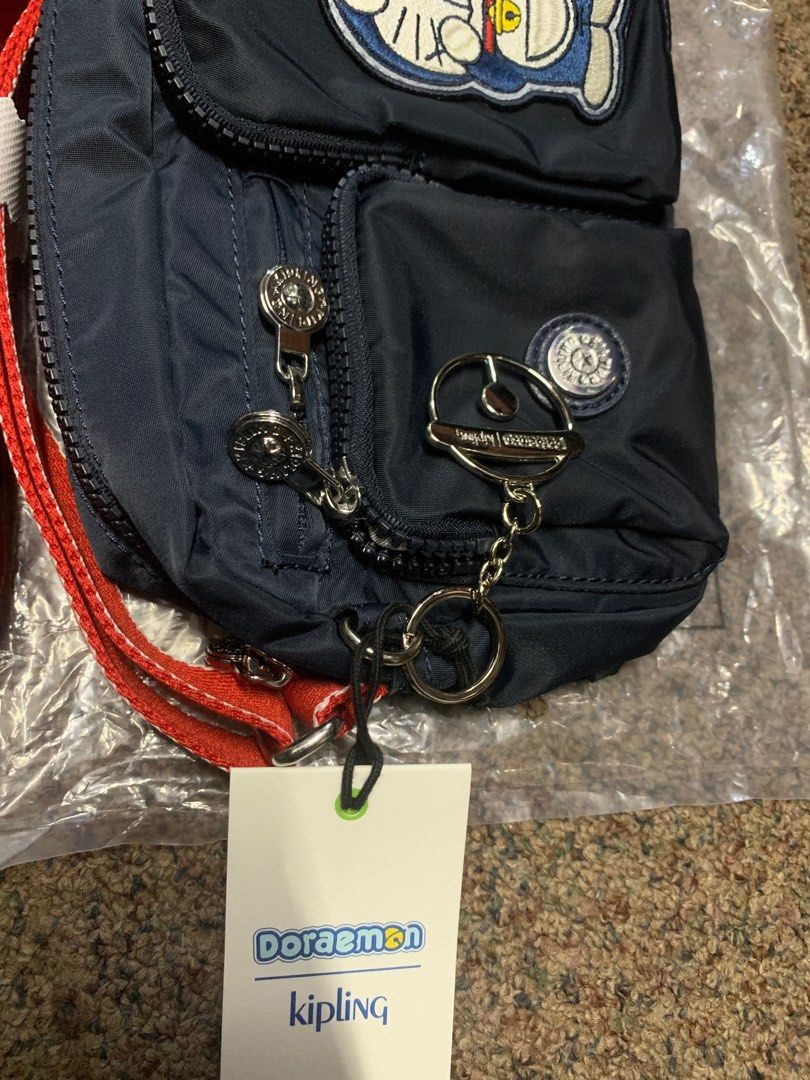 KIPLING ALBENA DORAEMON, Women's Fashion, Bags & Wallets, Cross-body ...