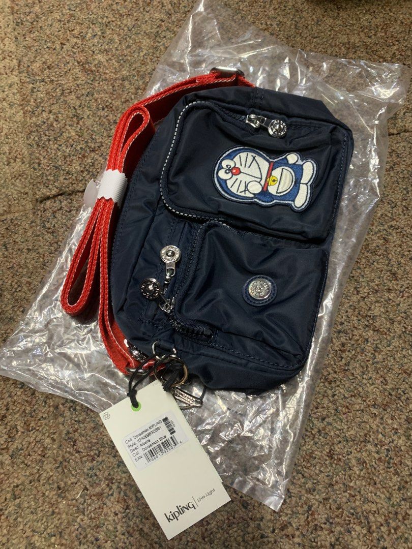 KIPLING ALBENA DORAEMON, Women's Fashion, Bags & Wallets, Cross-body ...